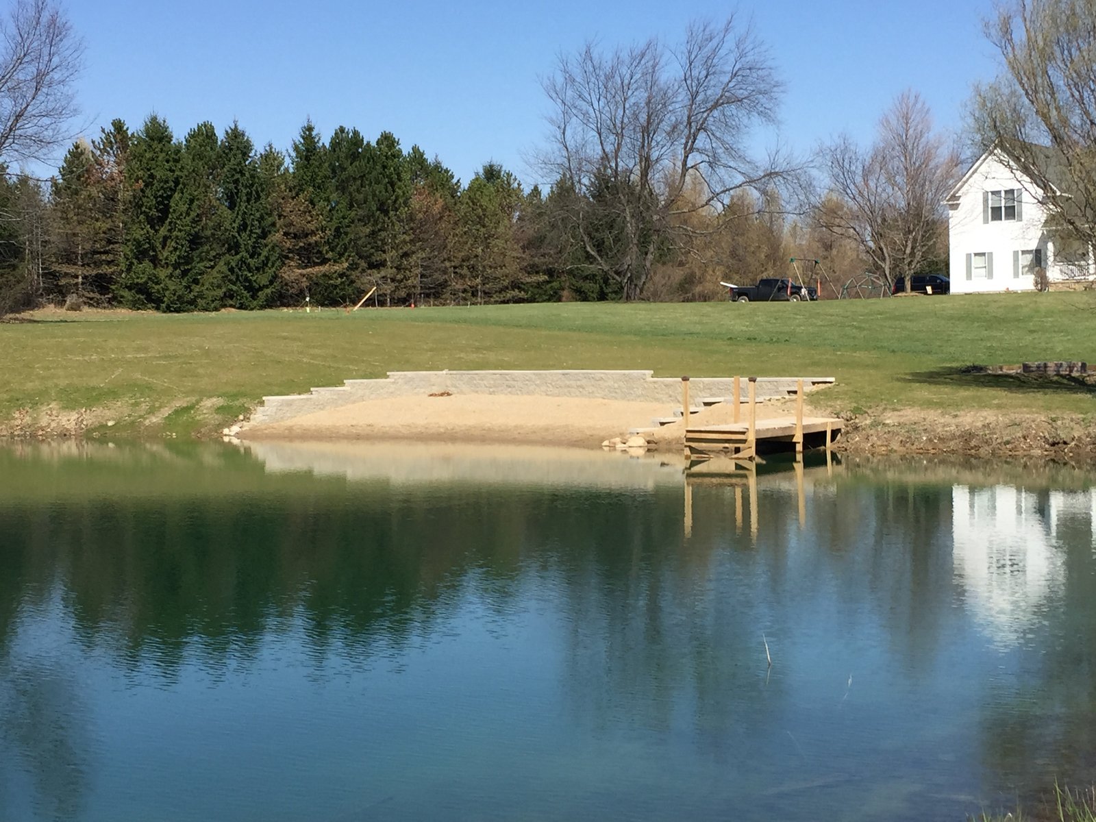 Howell, Michigan pond problems repaired windmill beach installation