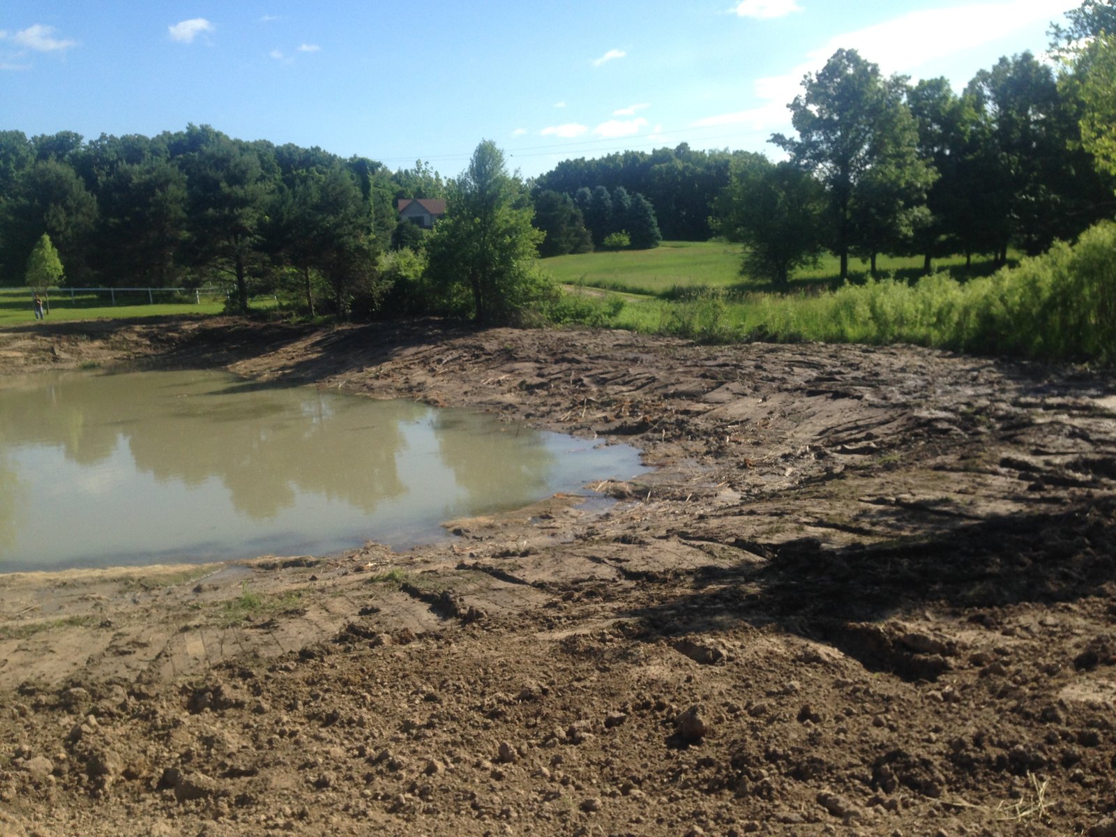 Howell, Michigan pond problems repaired windmill beach installation