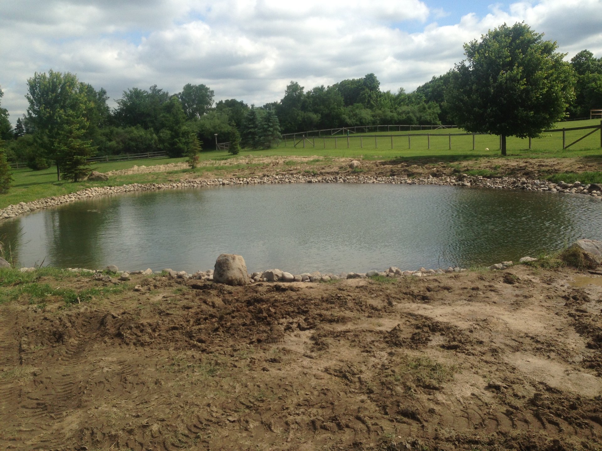 Backyard pond bank stabilization Michigan, Howell